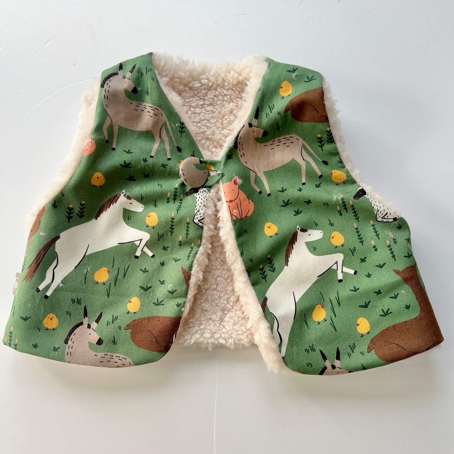 Fully Reversible fleecy gilet lined with your choice of print. – Eddie ...