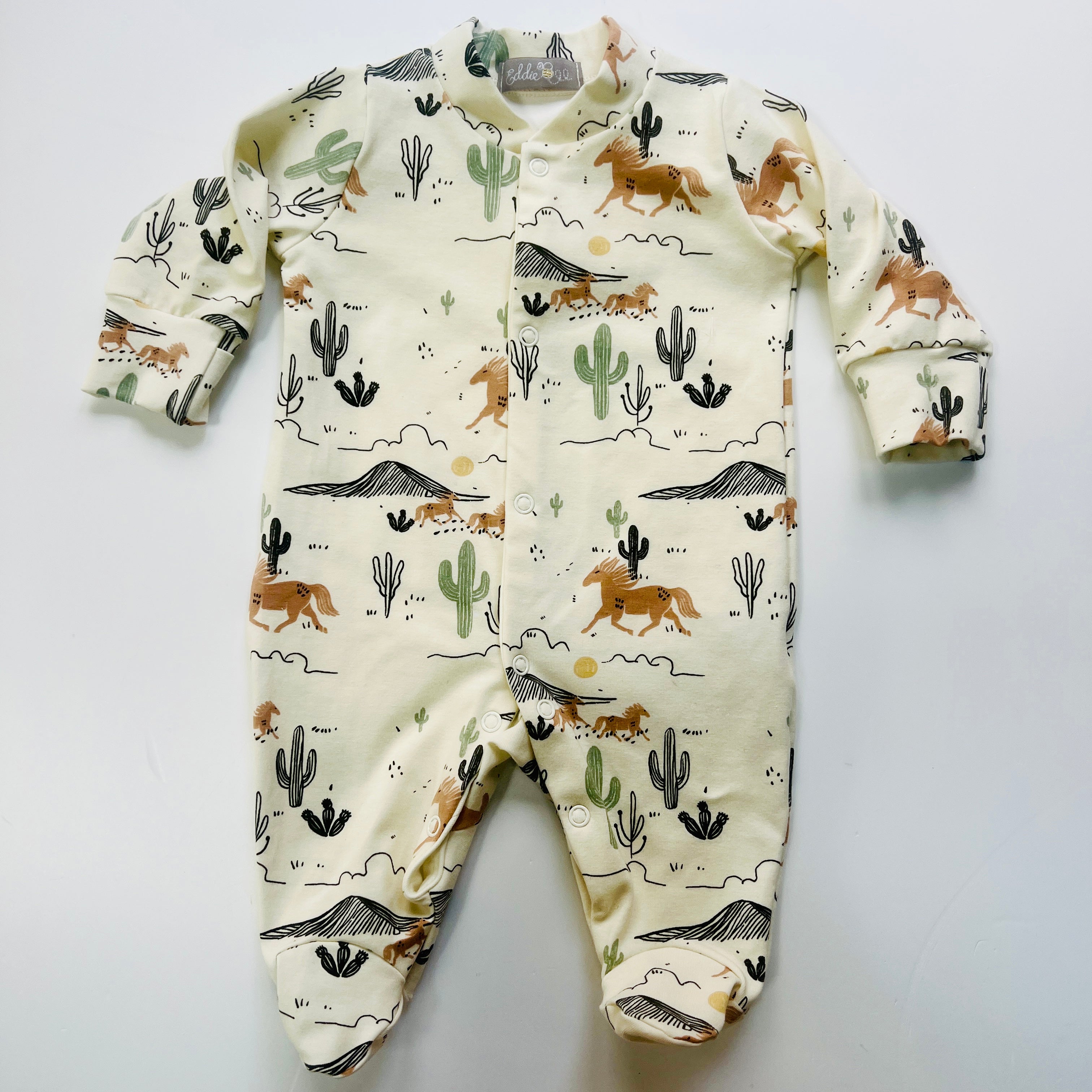 Eddie & Bee organic cotton Baby sleepsuit in Cream " Wild West " print